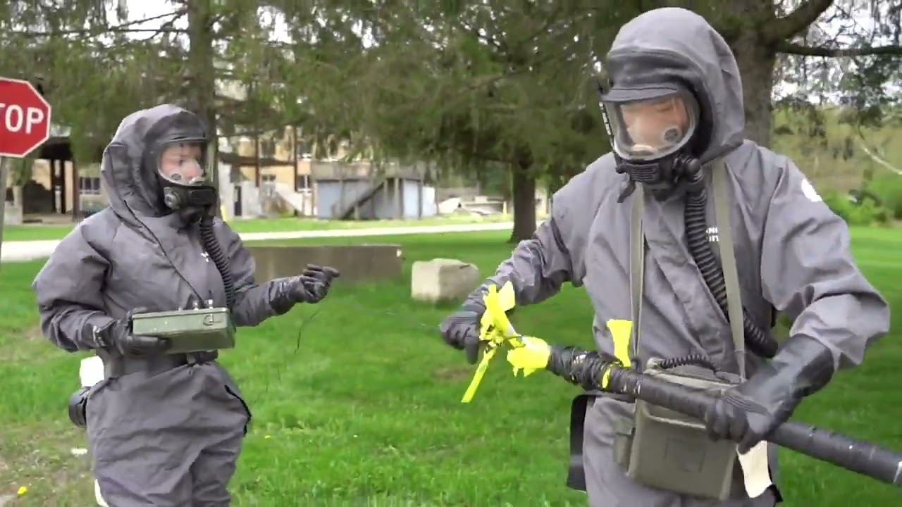Women in chemical protection + panoramic gas mask. Comfortable ...