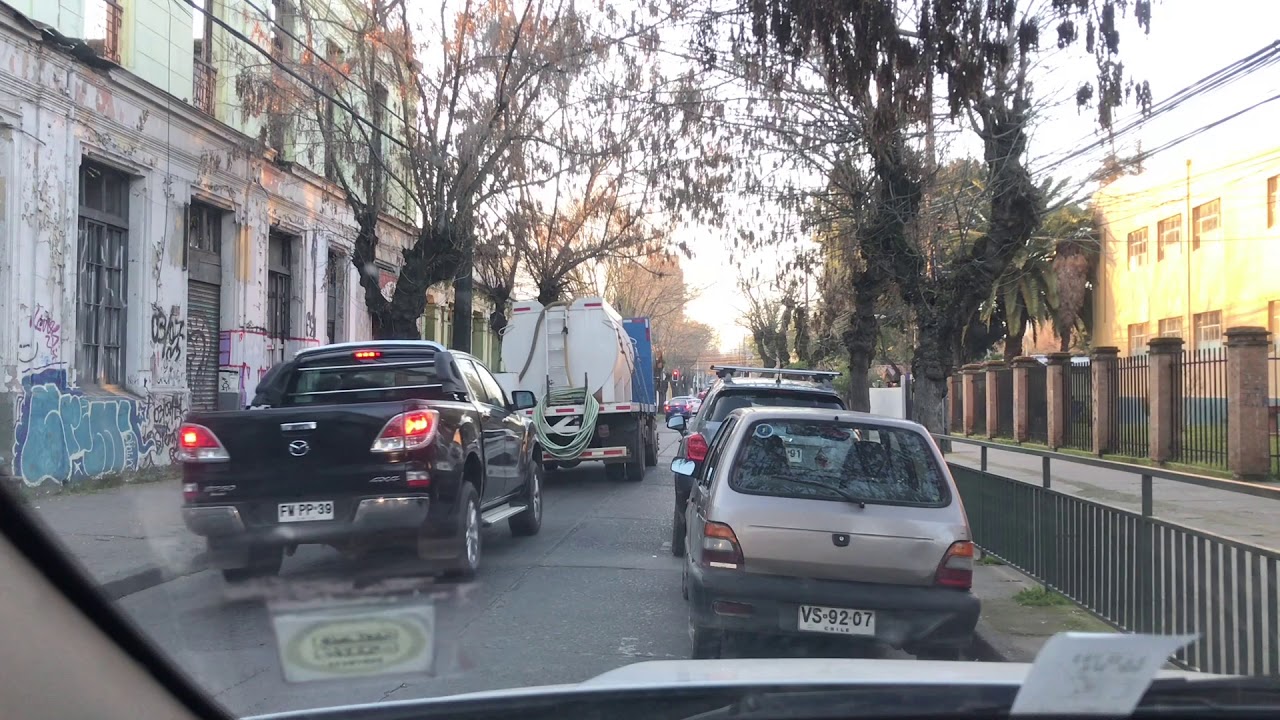 Cars Passing By On A Quiet Downtown Street - YouTube