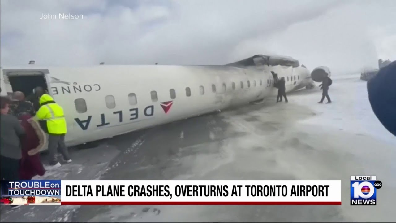 Delta plane flips upside down on runway at Toronto airport - YouTube