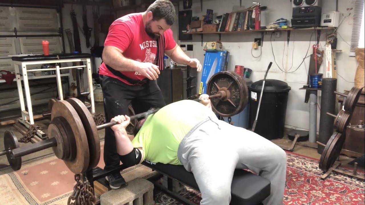 Bench press with 305 pounds of bar weight and 120 pounds of chain ...