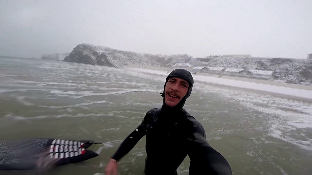 SURFING IN THE SNOW - YouTube
