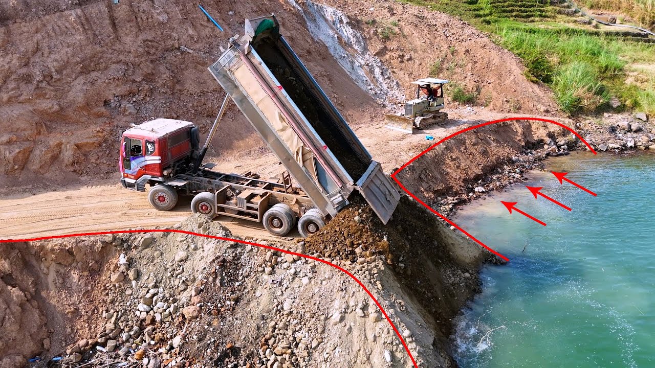 Working Hard To Add More Rock Soils For Build The Road Less On The ...