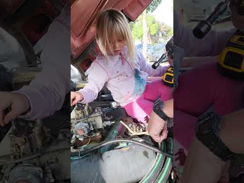 Logan helping daddy remove an intake manifold on my 1978 F150, 400M ...
