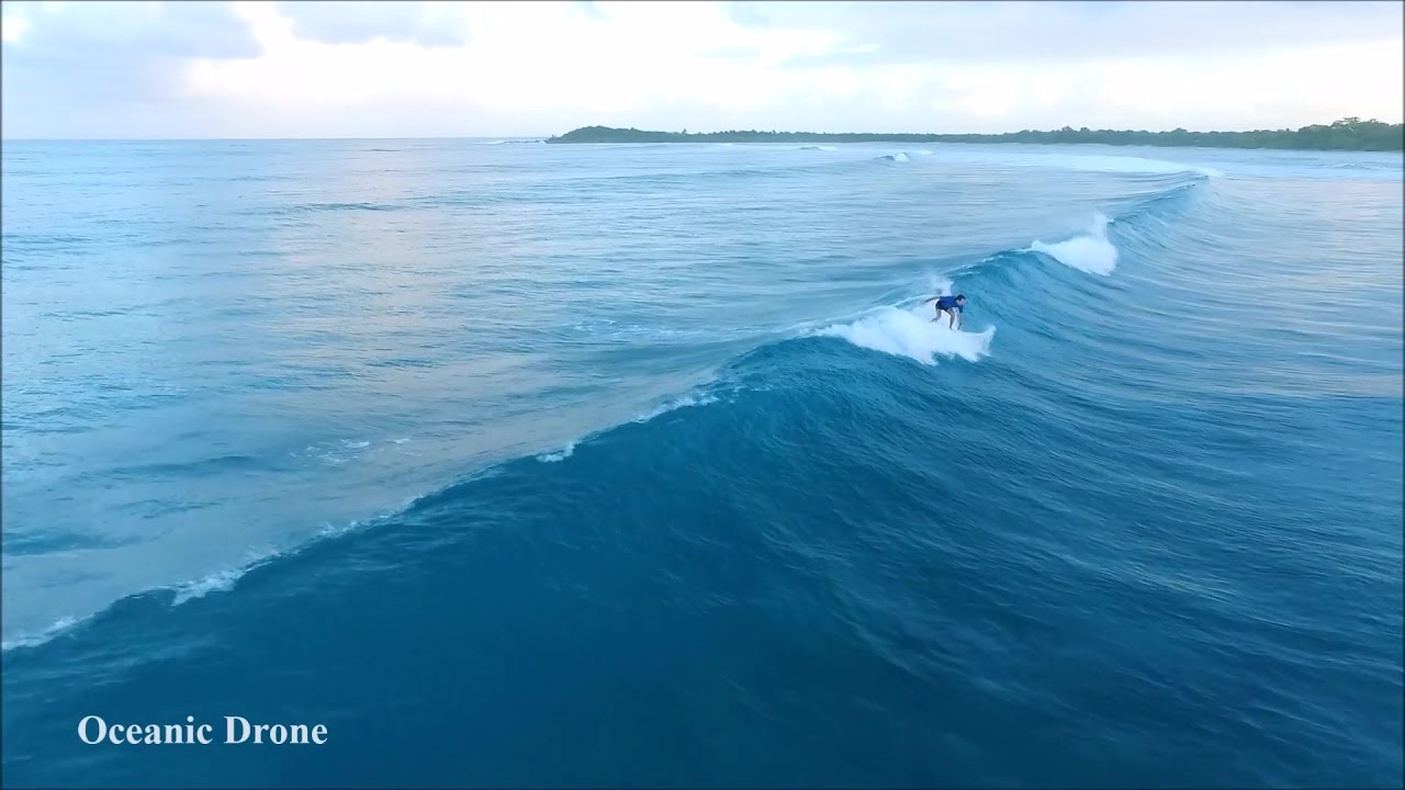 Surfing alone in a Caribbean island - drone view - YouTube