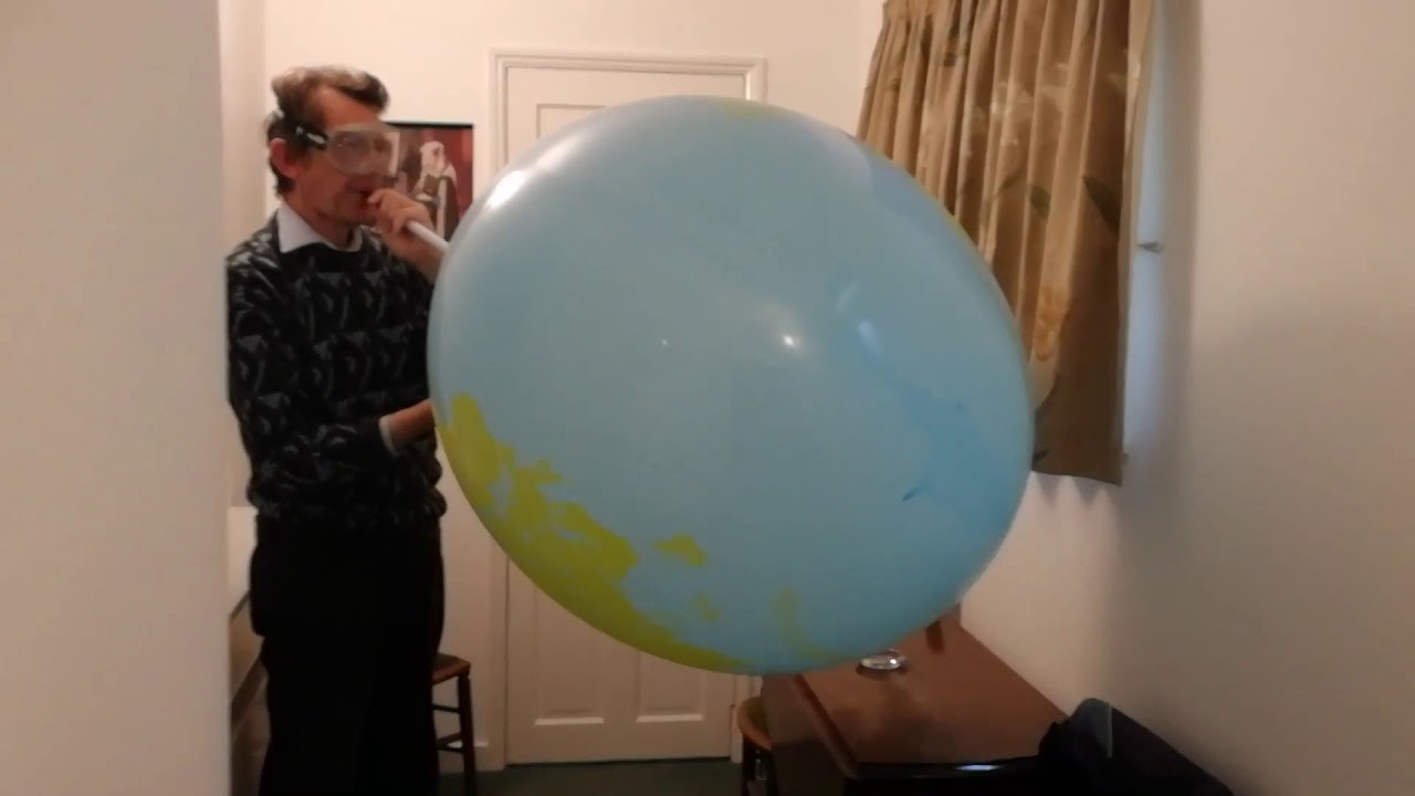 Blowing up to burst a giant globe balloon using lung power only part 2 ...