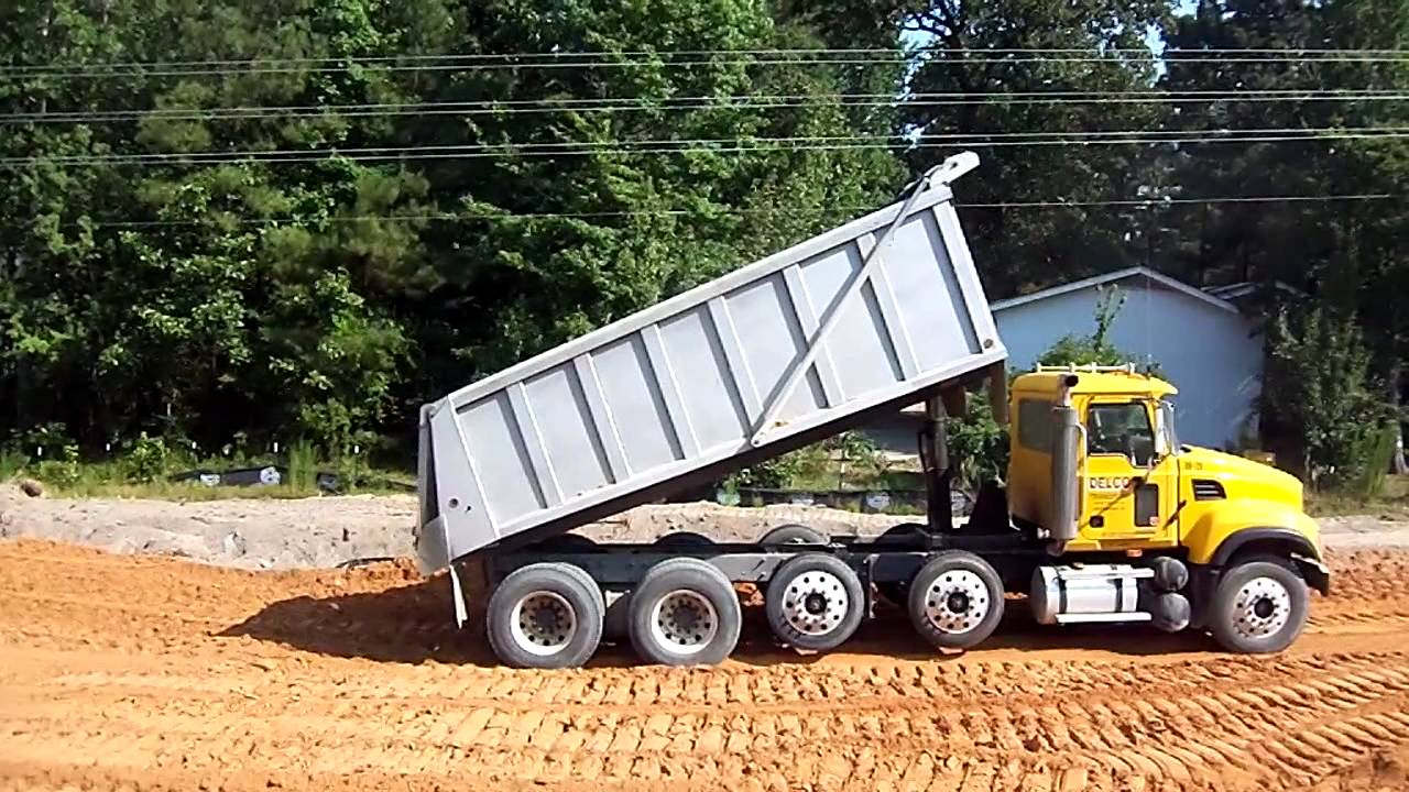 Delco Transport Mack granite quad dumping clay - YouTube
