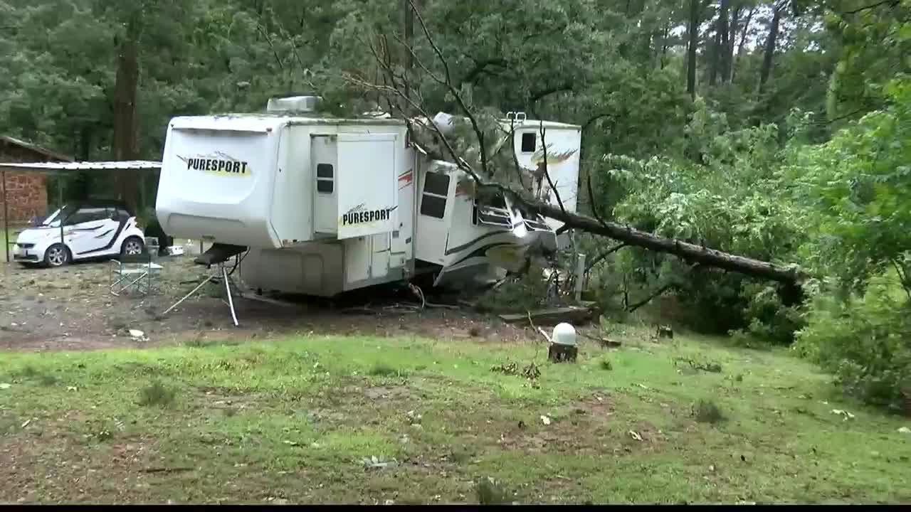 Storm damages buildings; 1 person hurt when tree falls on RV at state ...