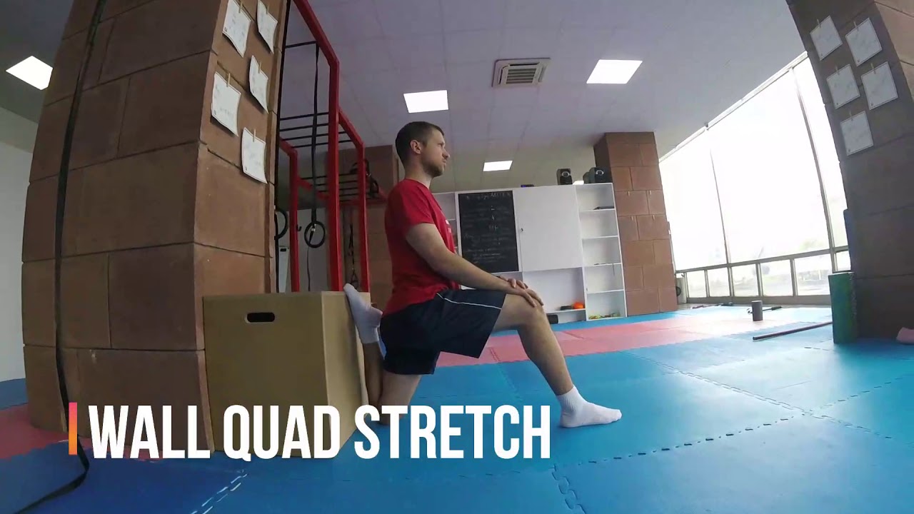 WALL QUAD STRETCH - Top Gym - YouTube