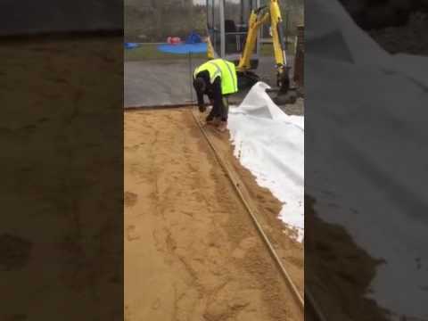 Inserting screed bars to correct level - YouTube