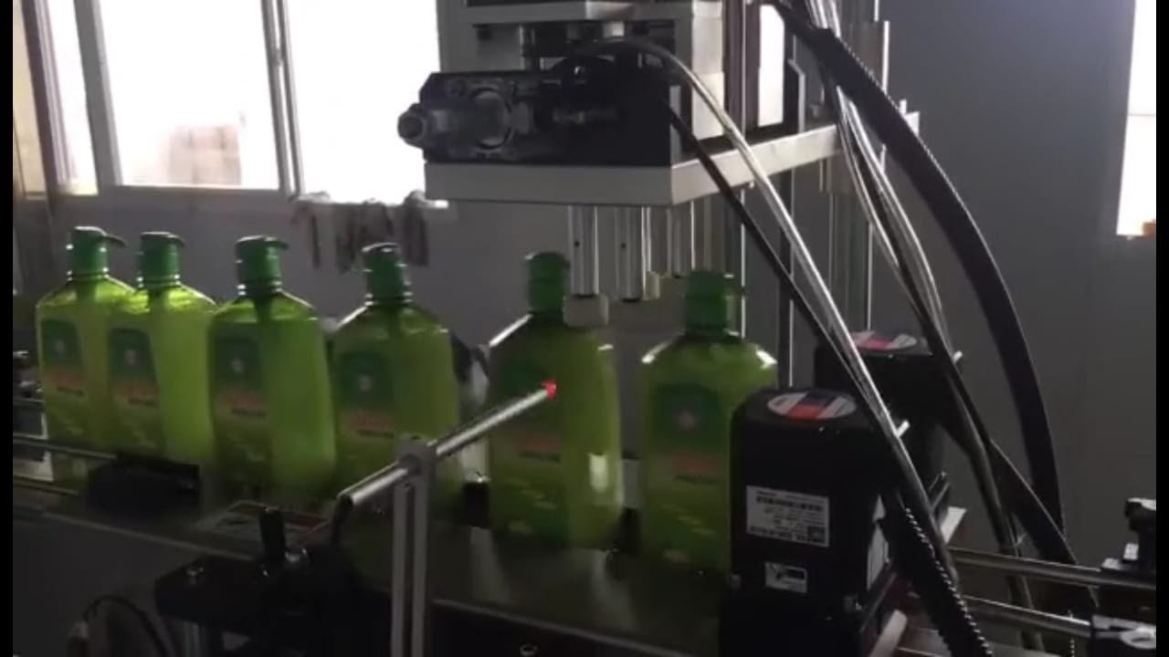 Automatic spindle linear capping machine (for pump caps) - YouTube