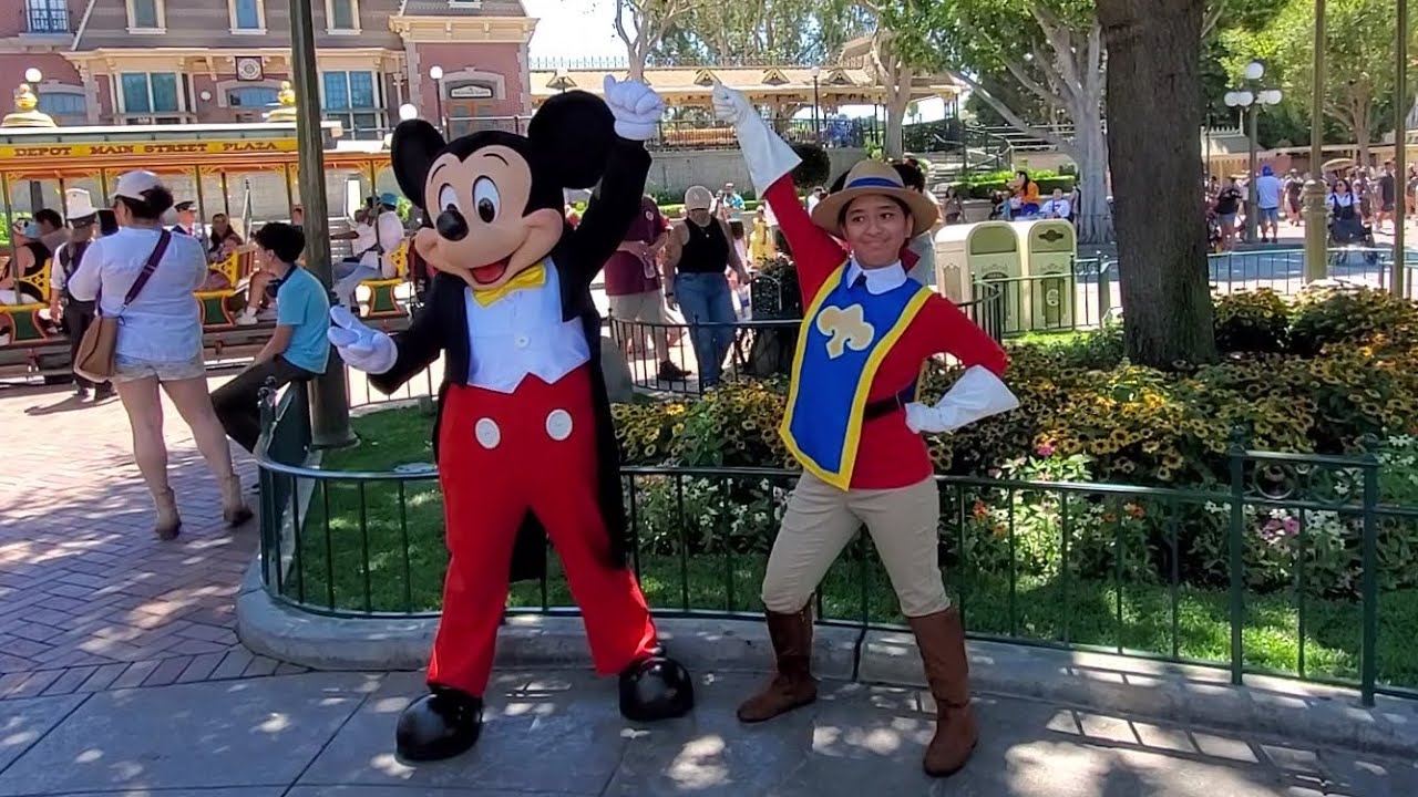 I as Musketeer Mickena meets Mickey Mouse at Main Street USA in ...