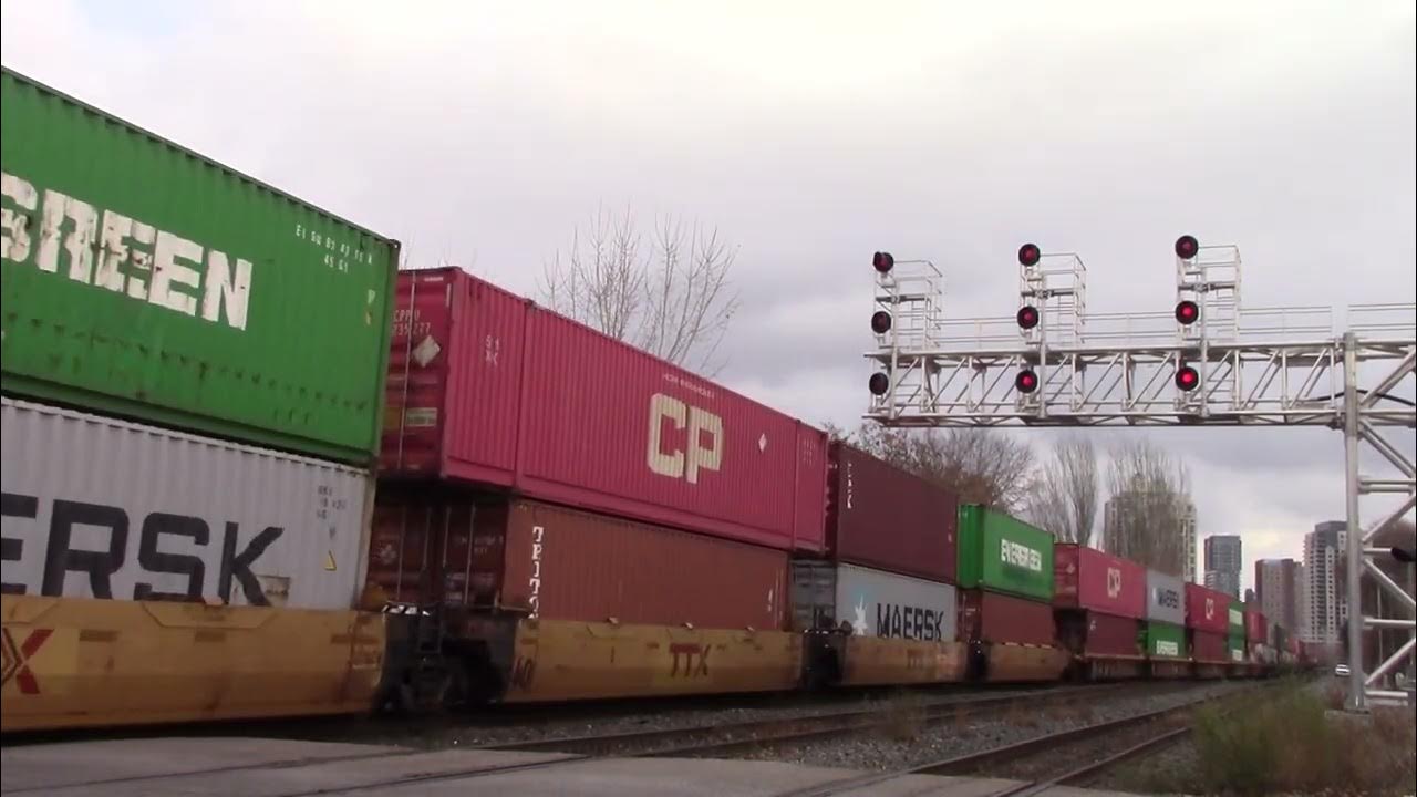 (CPKC) CP 113 with KCSM 4077 Mid DPU passing Osler - YouTube