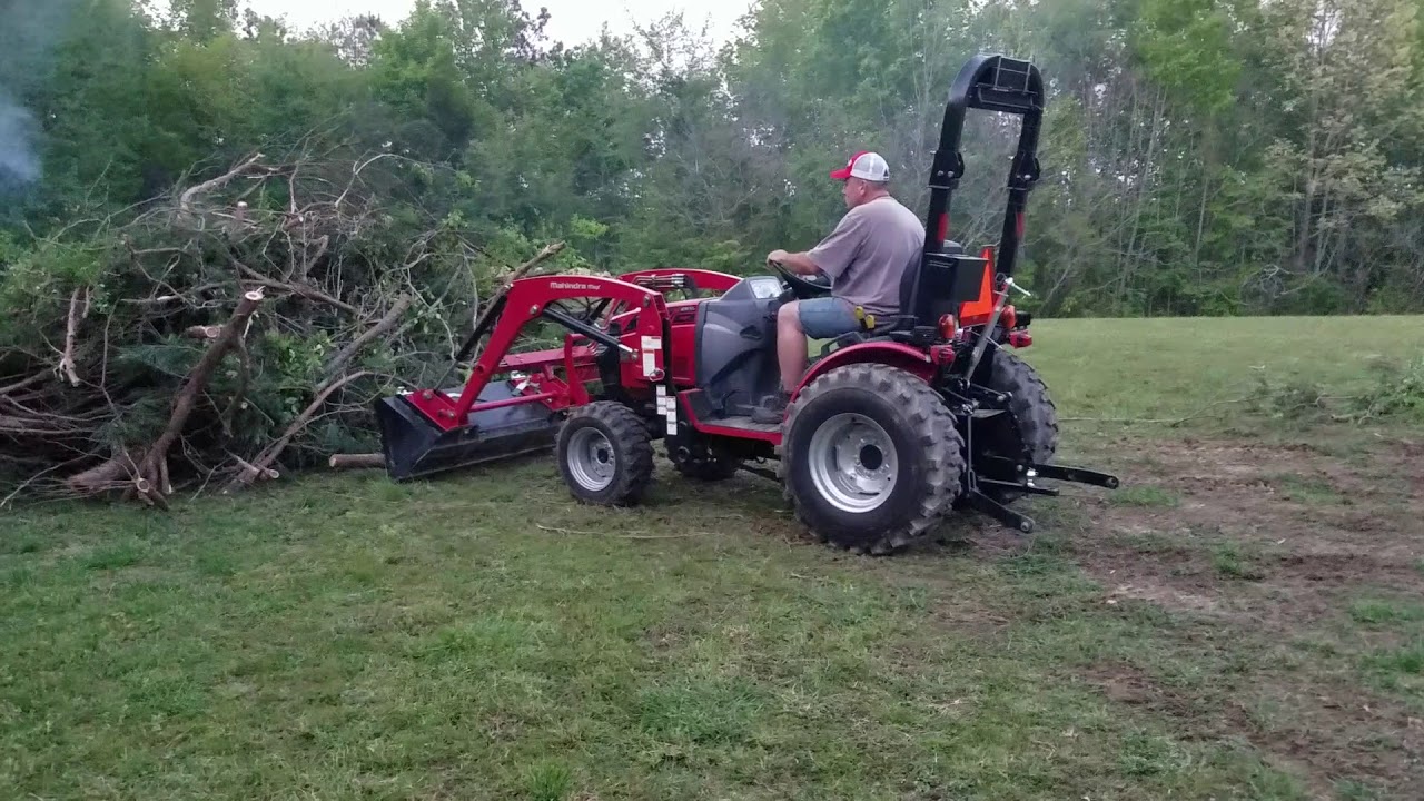 Mahindra Max 26 XL and the brush pile - YouTube