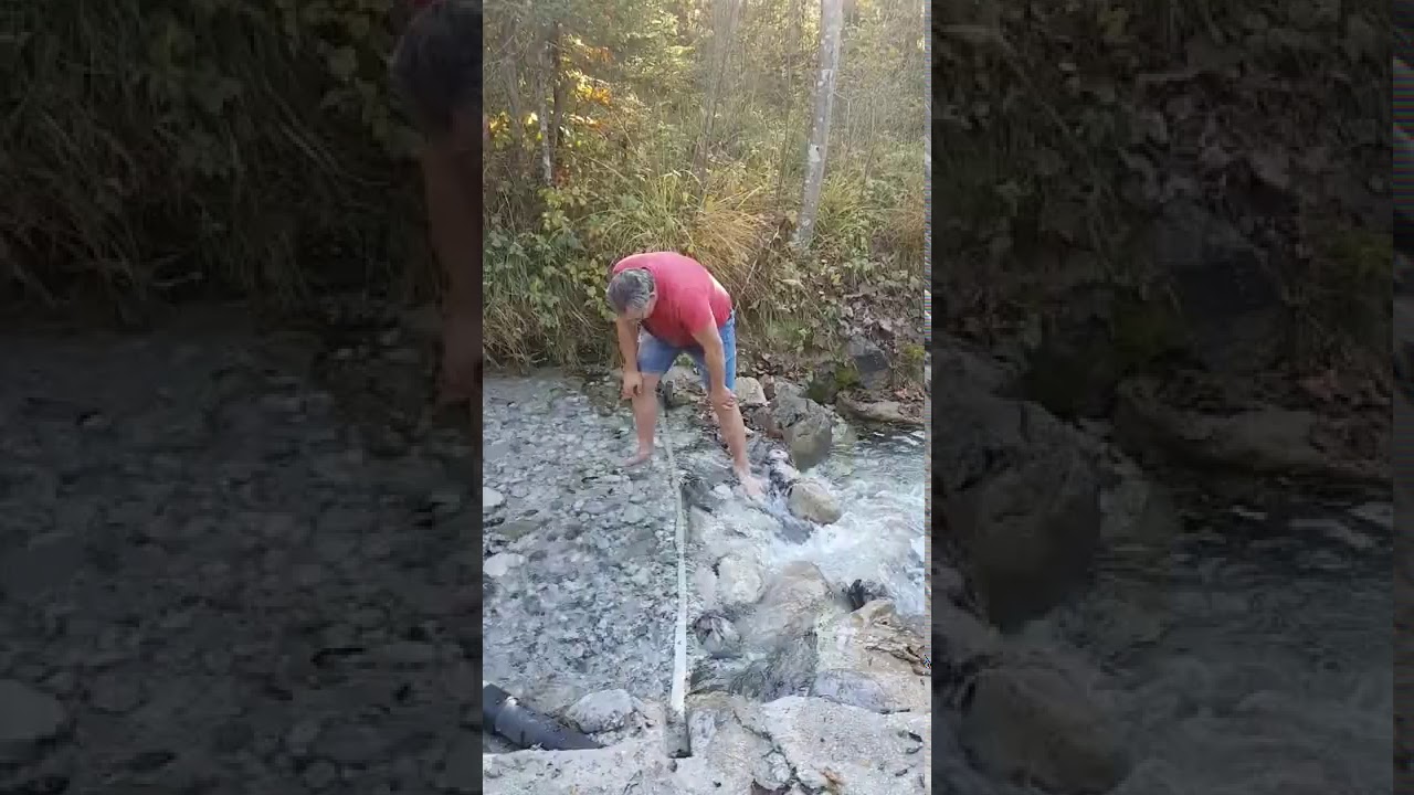 Man Slips and Falls Hilariously While Trying to Cross Stream of River ...