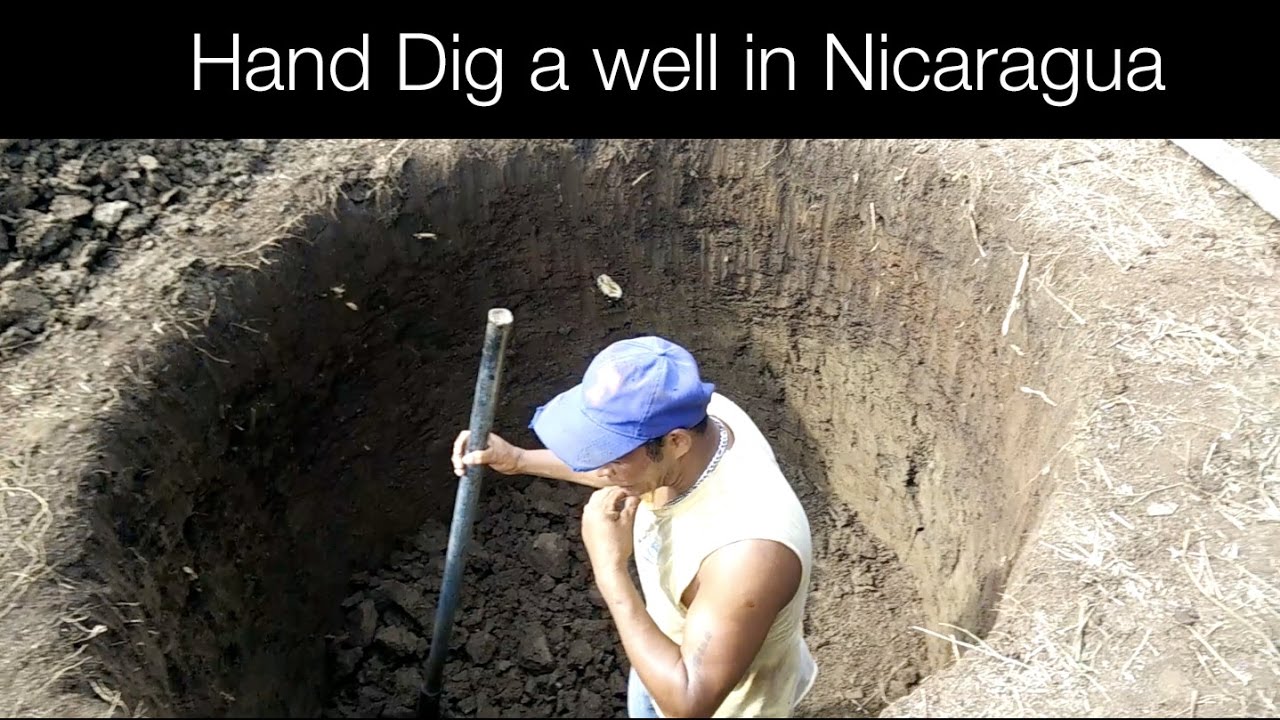 Hand digging a well in Nicaragua - YouTube