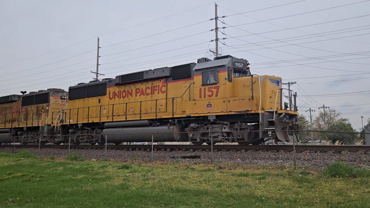 4-1-24 UP local with 2 Rock Island bankruptcy blue covered hoppers ...