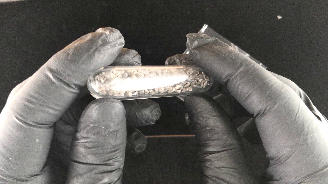 Calcium metal in Lucite acrylic cube - YouTube