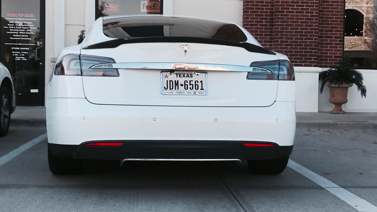 Debadging a tesla - YouTube