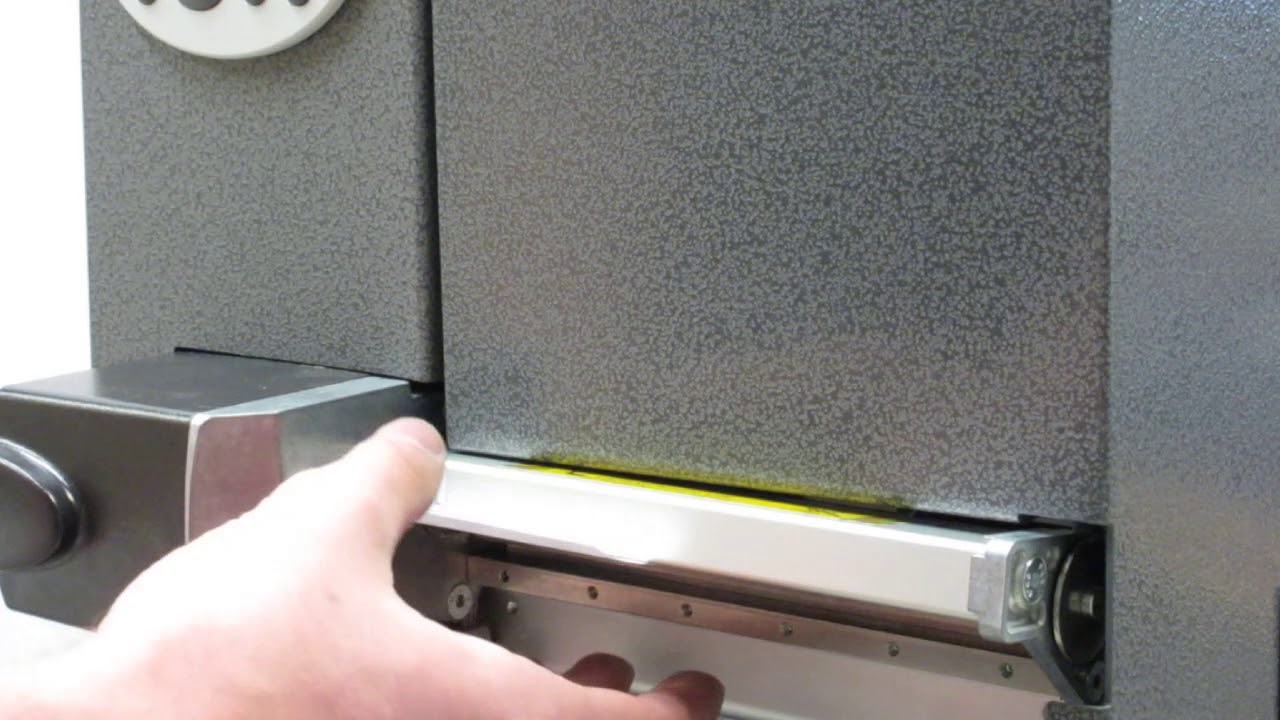 Tyvek Roll Label Printer with Label Cutter - YouTube