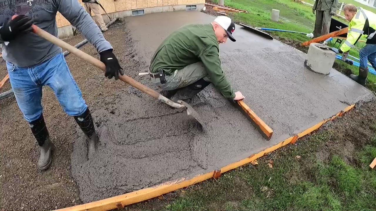Home Build EP 47 Pouring Exposed Aggregate with Hard Trowel Bands - YouTube