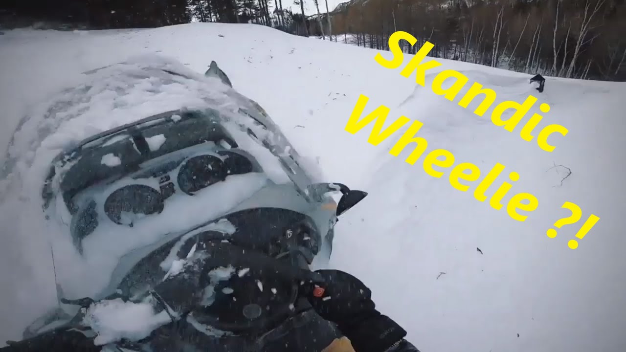Skandic in deep snow - YouTube
