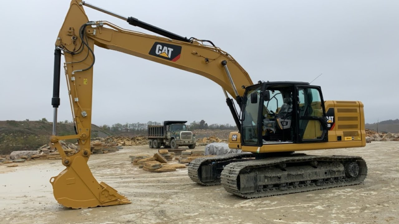 Next Generation Cat 320 Ripping Up Stone Along With Cat 320D - YouTube