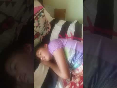 Waking up the birthday girl by tickling her feet