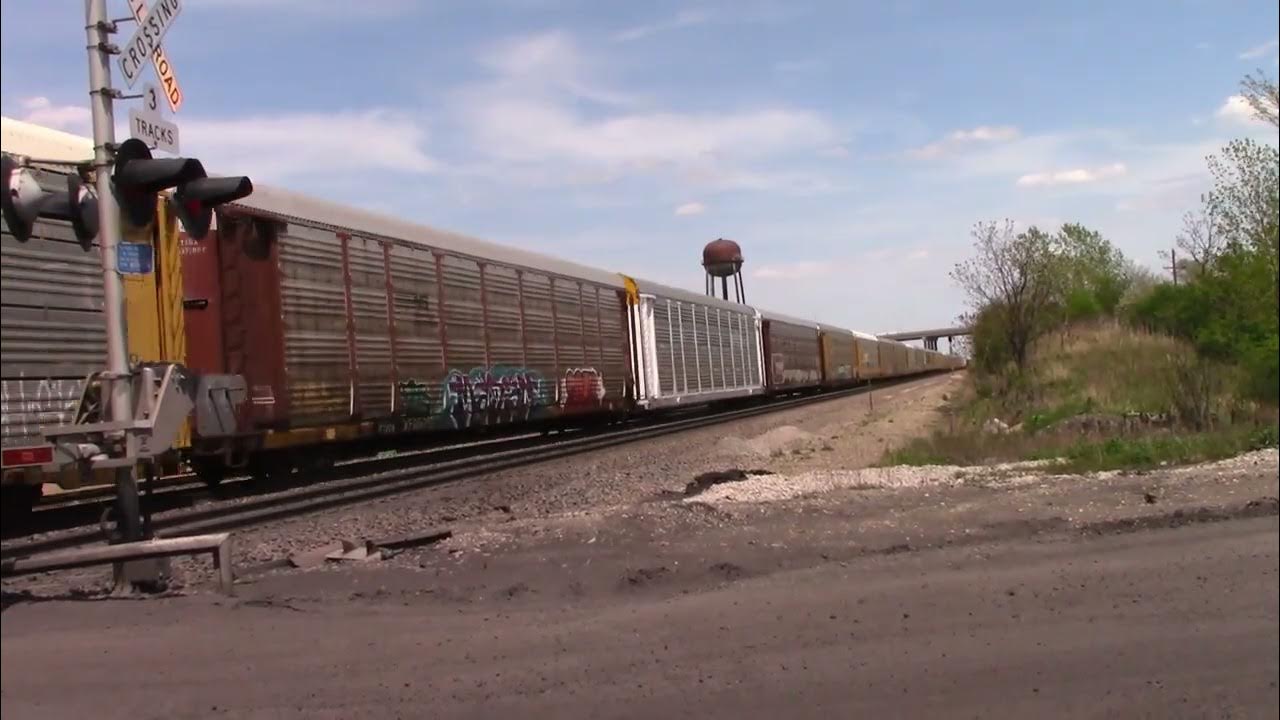 Westbound Loaded BNSF Autorack Train Cuts Between Factories and Oil Refineries - Lemont, IL ...