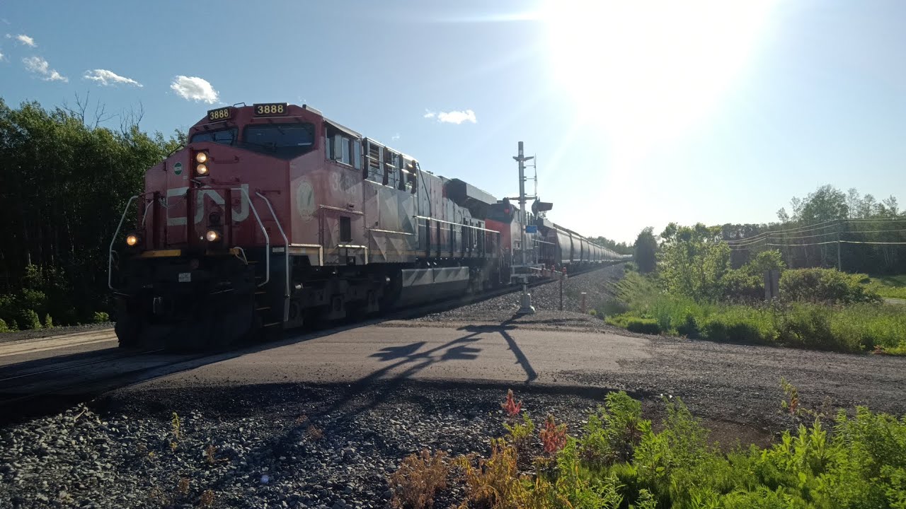 Short CN Sand train with a nice driver and with CN 100th anniversary ...