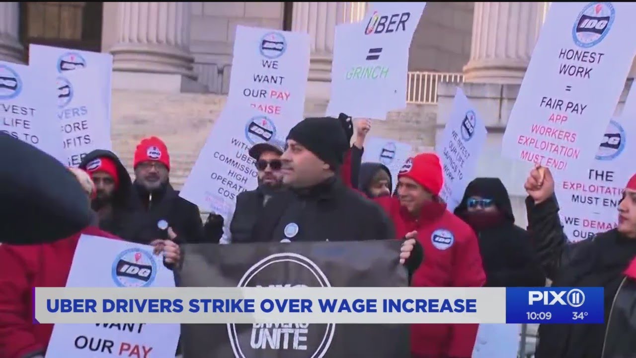 Uber drivers protest after lawsuit halts pay raise - YouTube