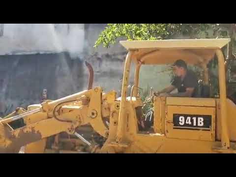 Pá carregadeira de esteiras Caterpillar 941B afiadissima - YouTube