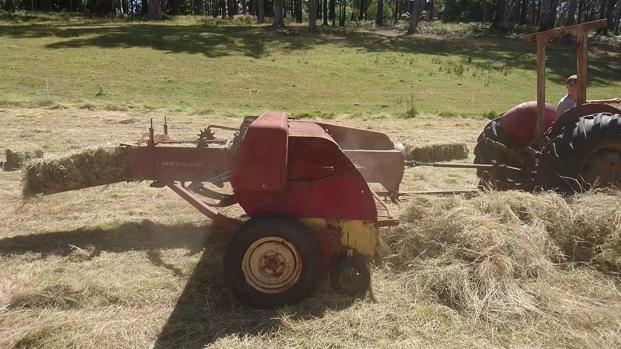 Making hay with my Massey Ferguson 65 tractor and the New Holland 68 ...