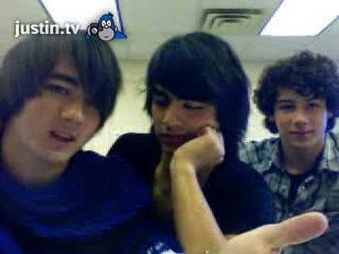 Nick being gorgeous as always and messing with Joe's hair!!!