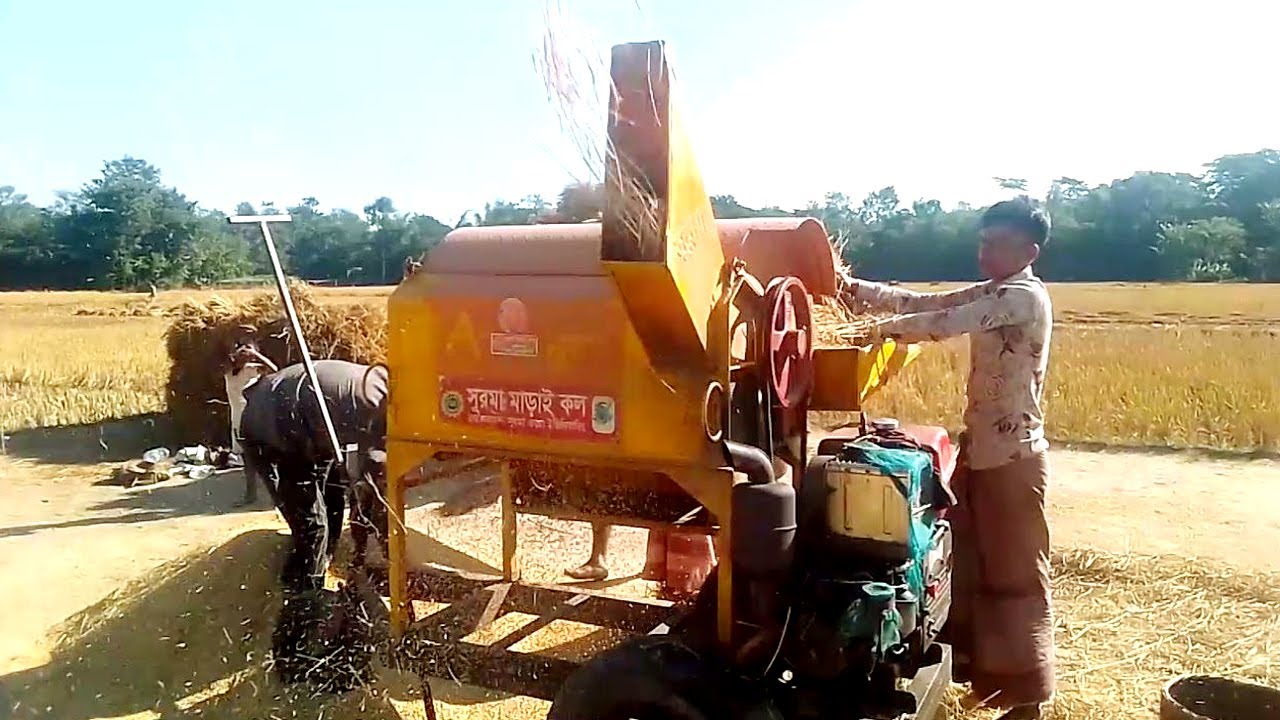 village excellent thresher machine video - YouTube