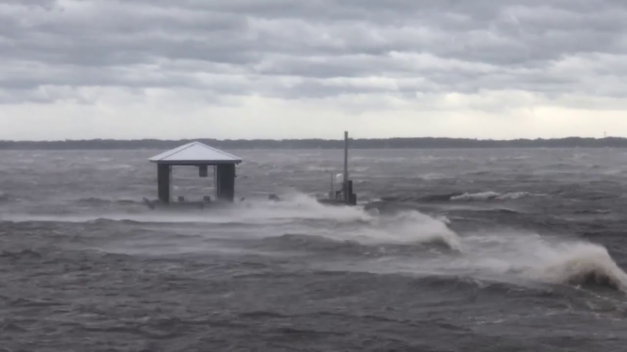 Wind driven water takes down docks - YouTube