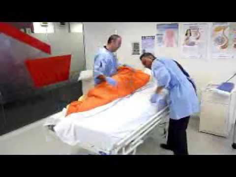 Linen change without moving patient out of bed - YouTube