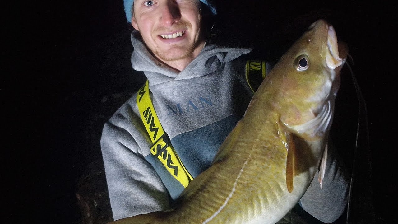fishing over big rocks and huge cliffs for cod boxing day special. - YouTube