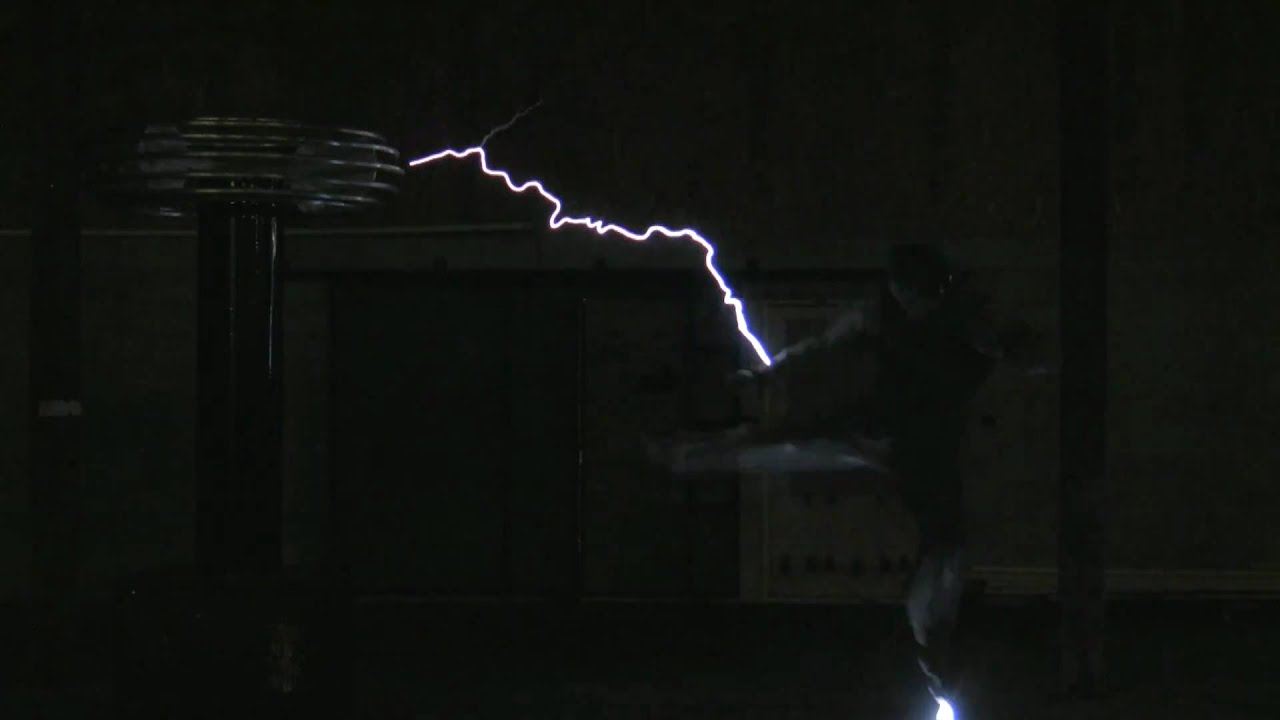 Tesla Coil Faraday Suit - YouTube