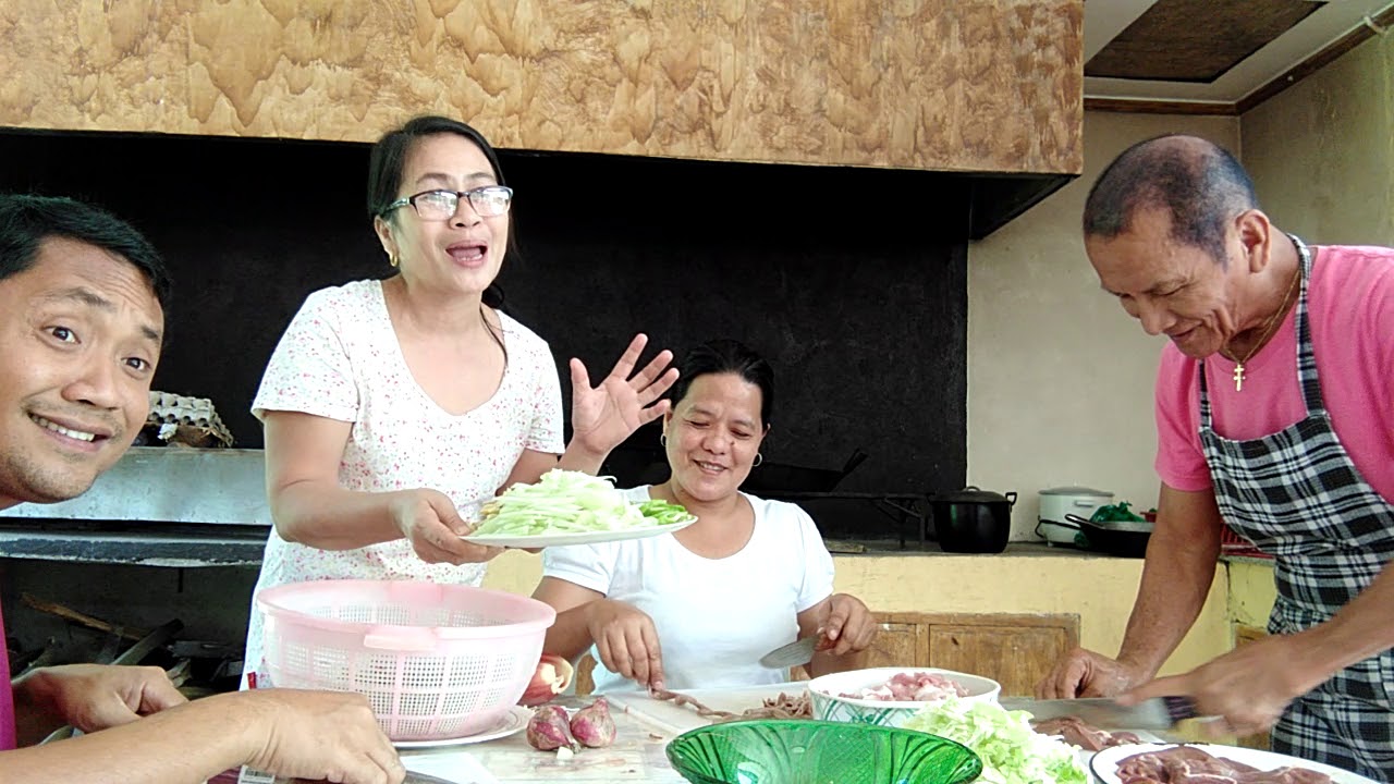 Preparing foods for fiesta sa Laray - YouTube