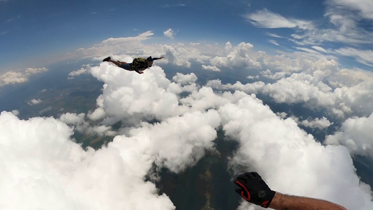 Flying through the clouds (jump 140) - YouTube