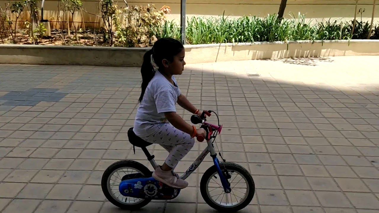 Milli. learns to ride bicycle - YouTube