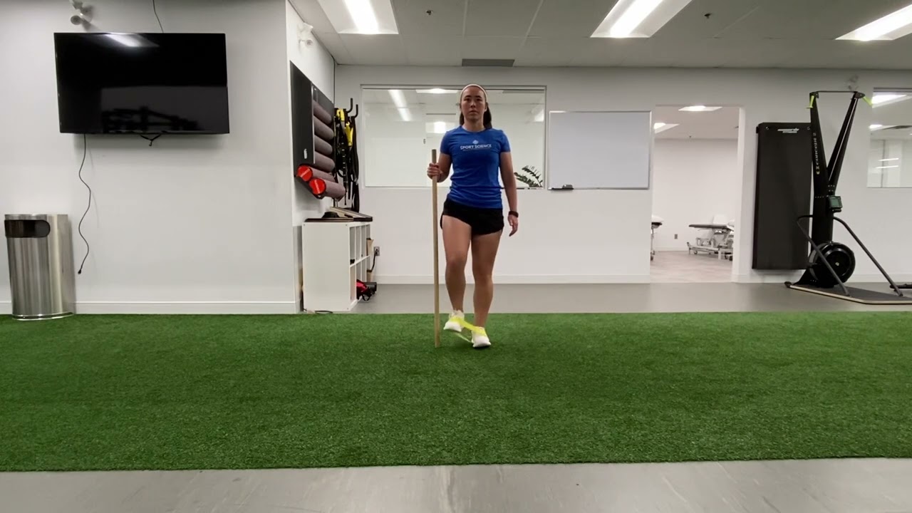 Standing Banded Psoas March with Dowel - YouTube