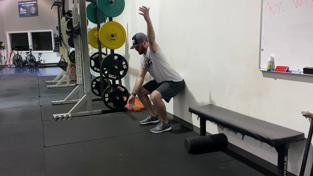 Wall Assisted Deep Squat Low Trap Raise - YouTube
