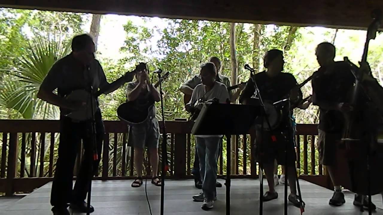 Larry playing banjo on a traditional bluegrass song at a bluegrass jam ...
