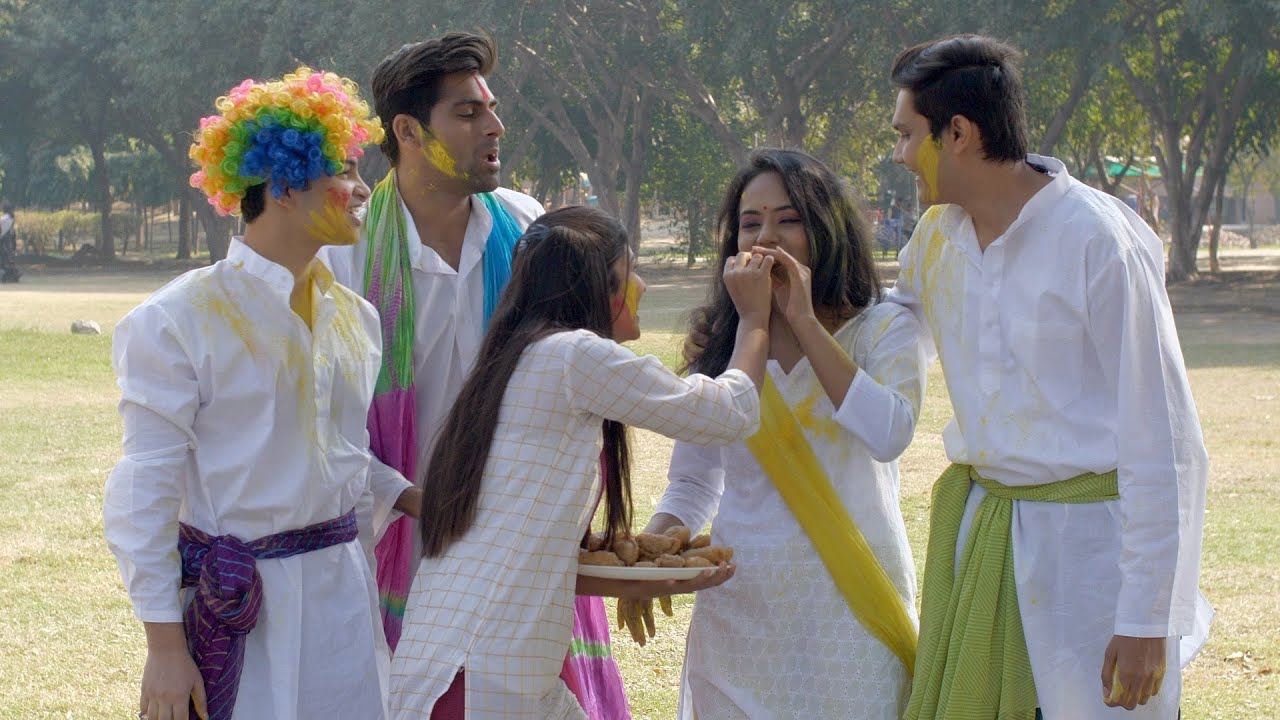 Group of Indian friends enjoying and celebrating Holi festival ...