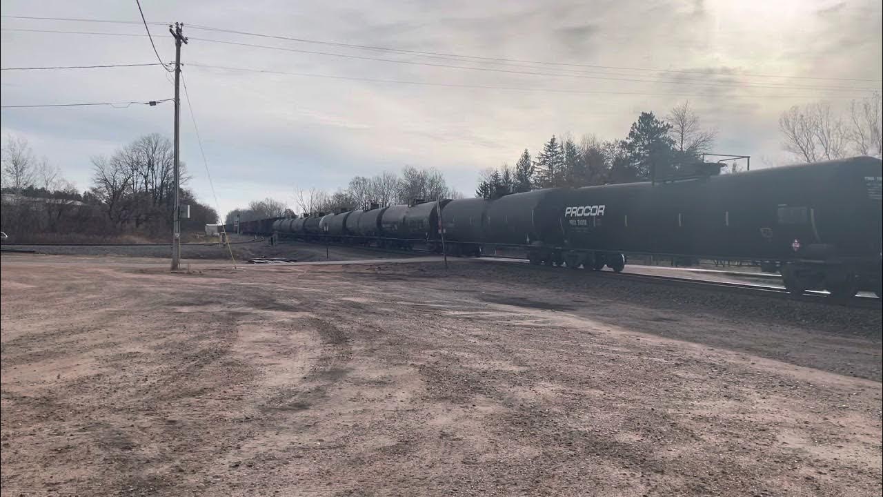 CN 3867 GE ES44AC leads CN 3044 & 3 EX-CITIRAILS 3962,3956 & 3951 on ...