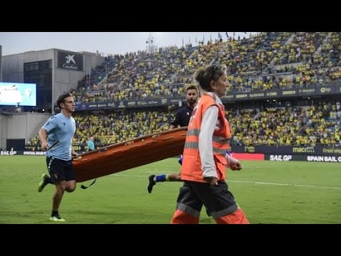 Player carry stretcher after fan suffer heart attack - YouTube
