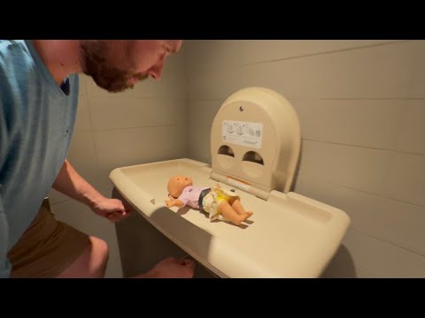 I Had To Save This Baby Doll From Being Crushed In The Changing Station In This Coffee Shop Restroom