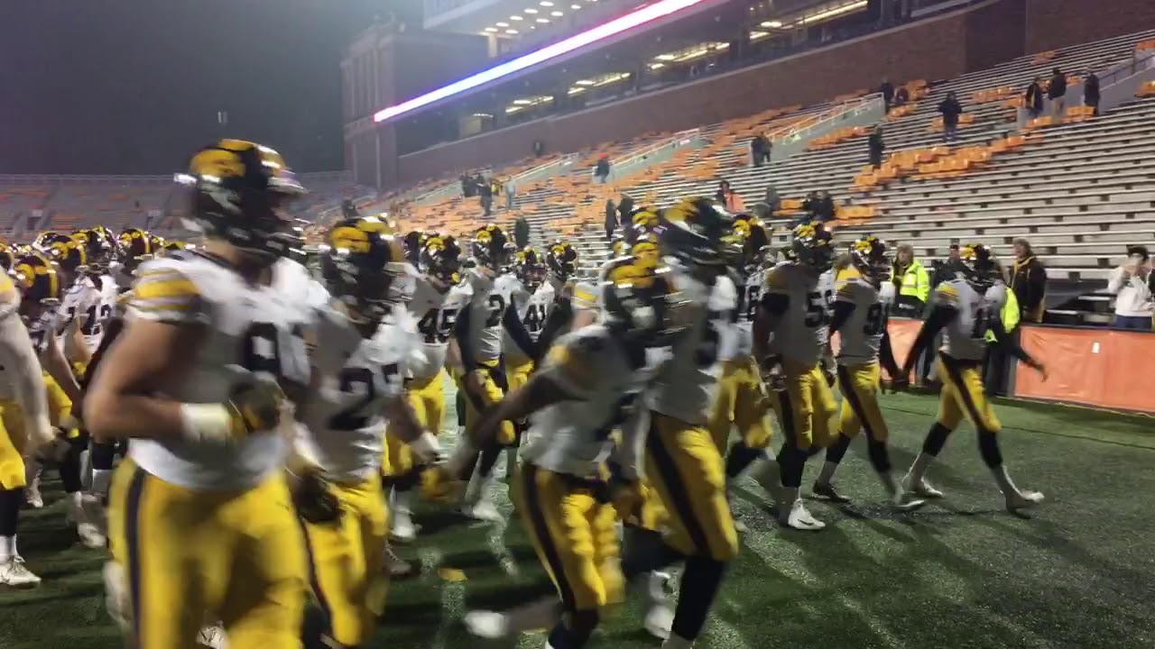 Iowa players swarm off the field after 63-0 win at Illinois. - YouTube