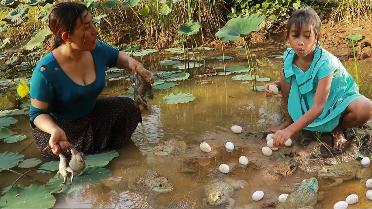 Mother with daughter catching frog & pick up duck egg for food-Cooking ...